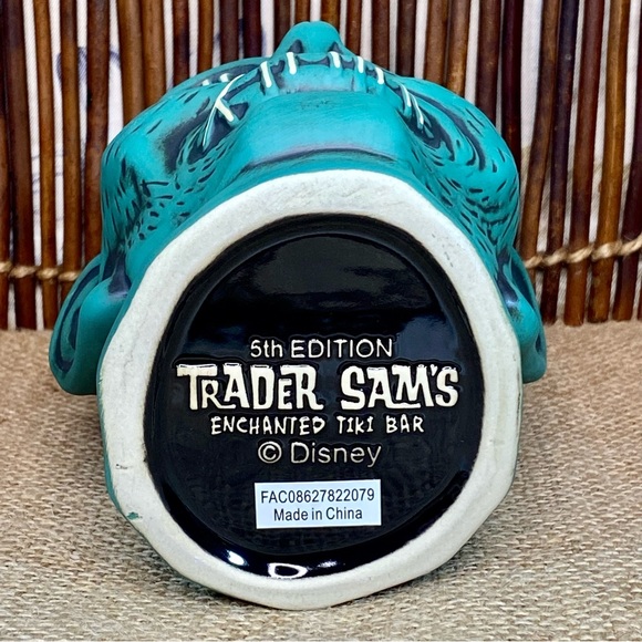 Trader Sams | Dining | Trader Sams Enchanted Tiki Bar Shrunken Head ...
